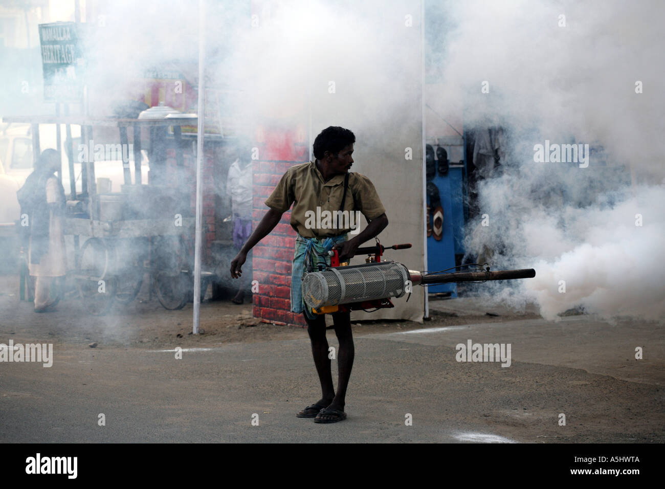 Man killing insects hi-res stock photography and images - Alamy