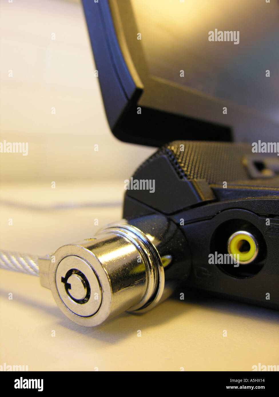 Laptop locked to desk hi-res stock photography and images - Alamy