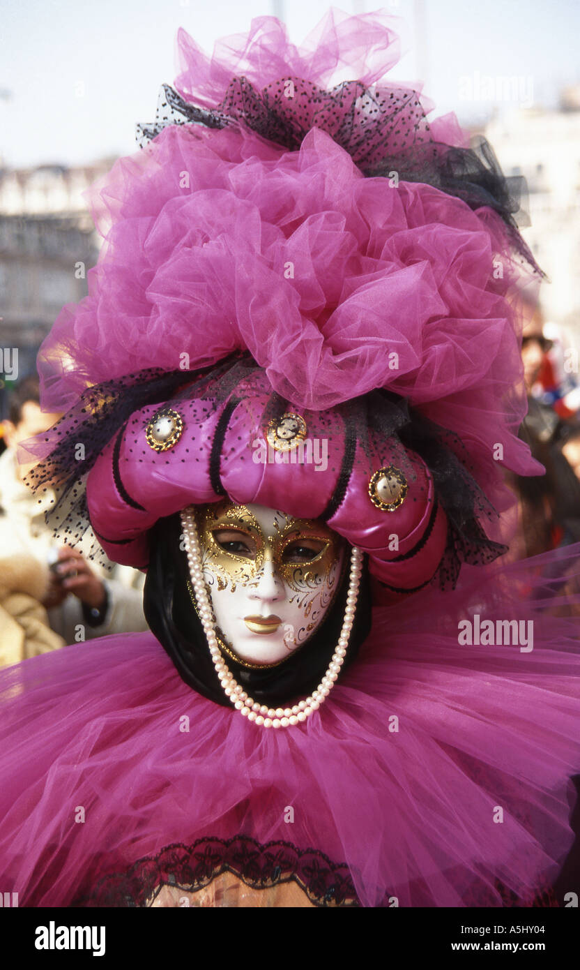 Person in colourful masked disguise, Venice carnival Italy Stock Photo ...