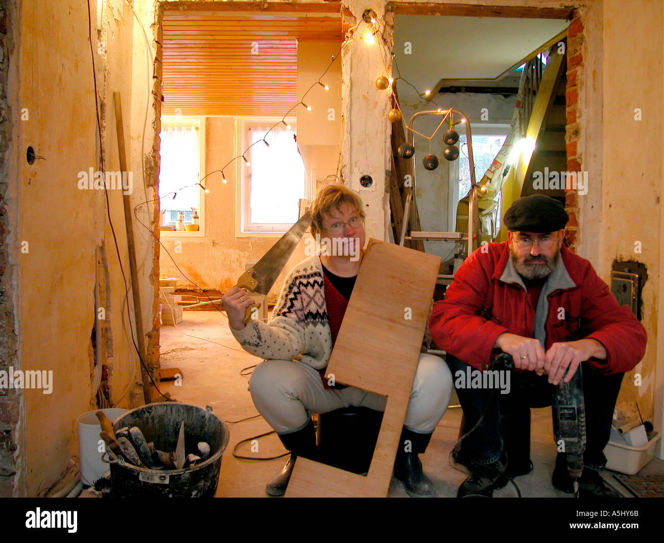 MR PR despaired couple at a chaotic building site renovating a flat ...