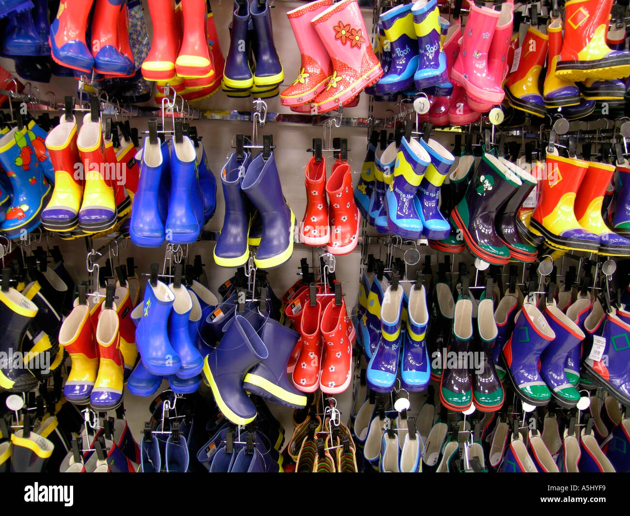 rubber boots in different colours for sale Stock Photo - Alamy