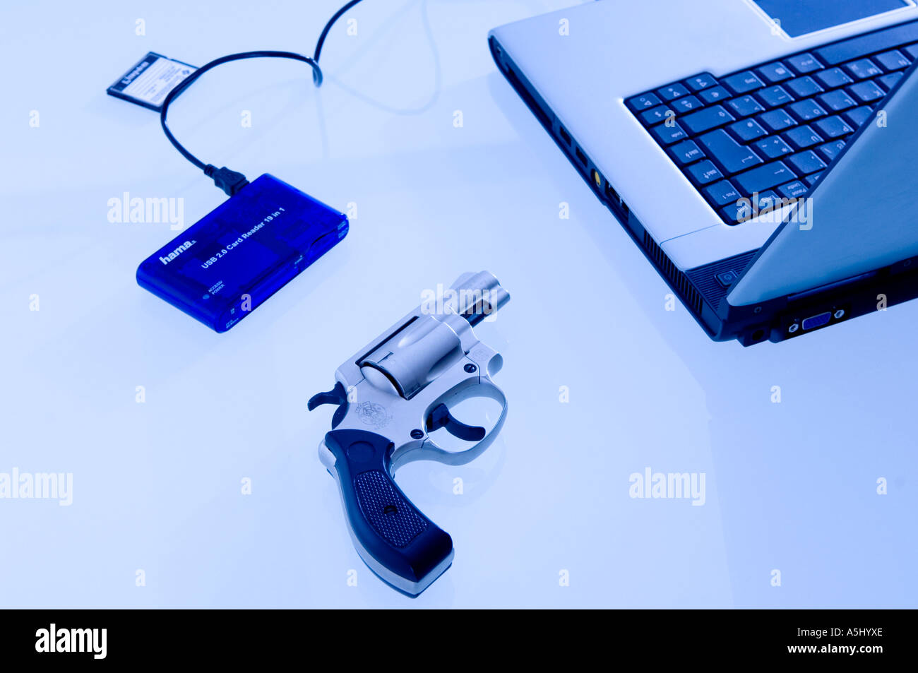Crime internet laptop pistol hi-res stock photography and images - Alamy