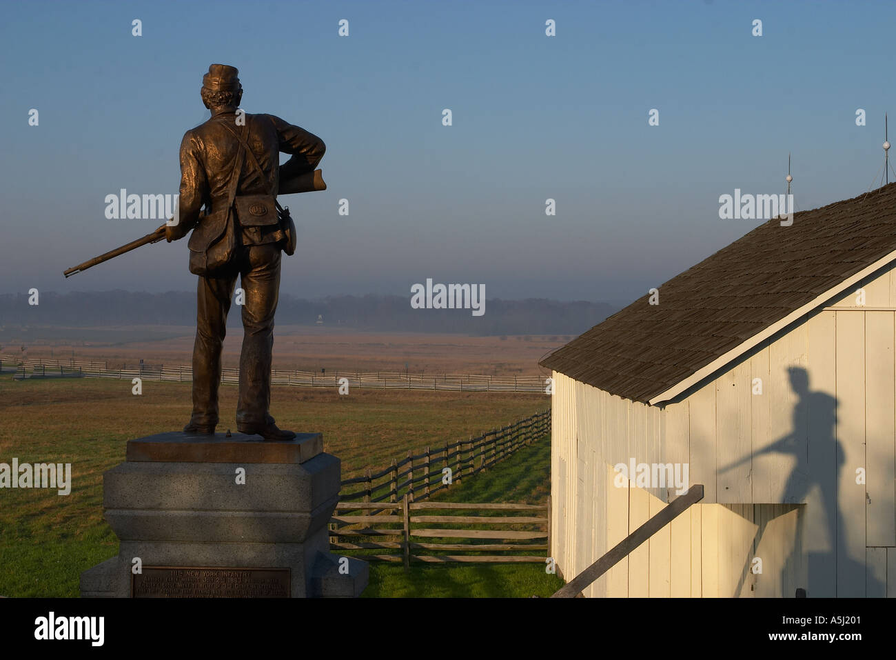 Soldier statue and shadow Stock Photo - Alamy