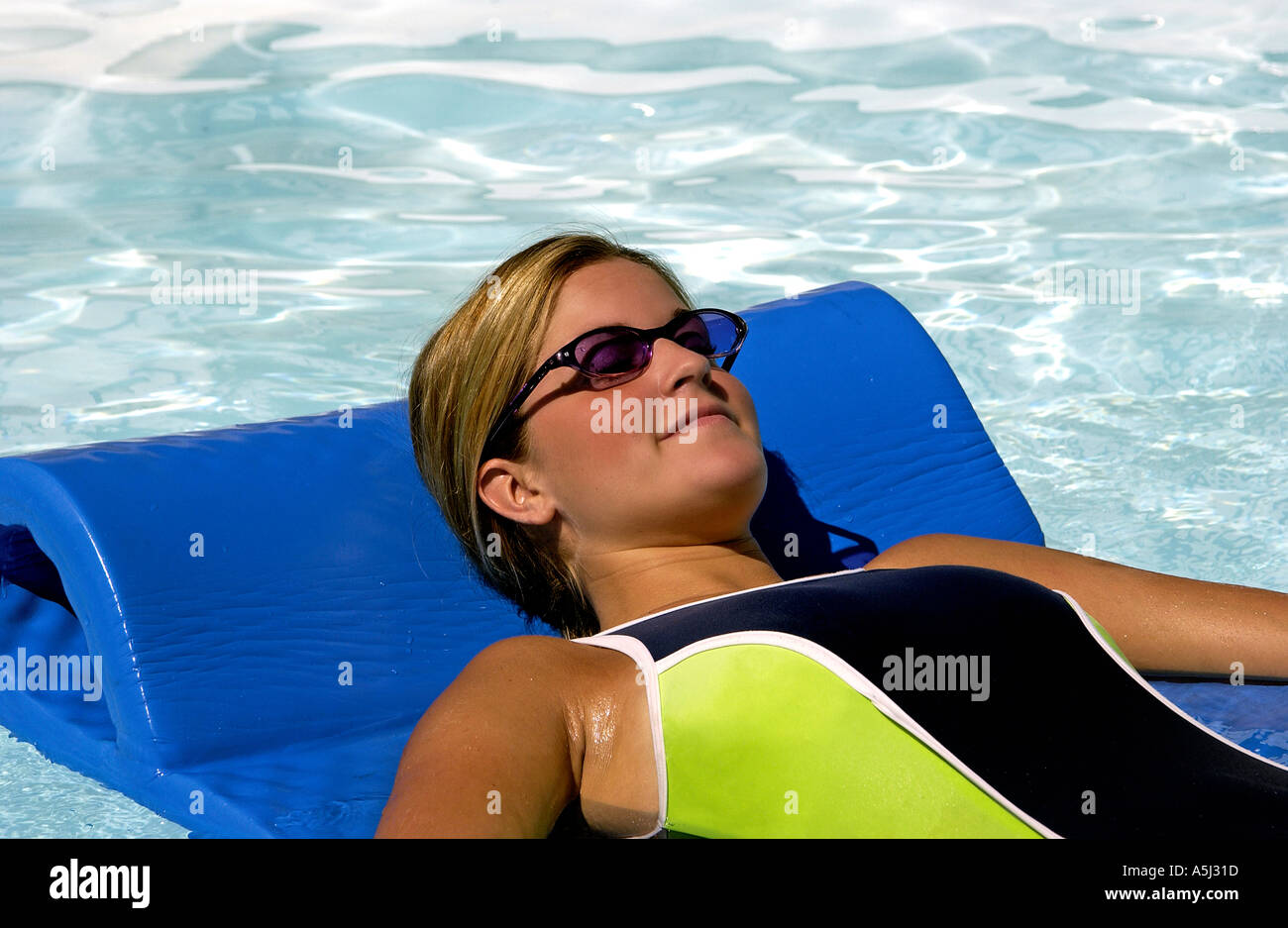 Wearing bathingsuit hi-res stock photography and images - Alamy