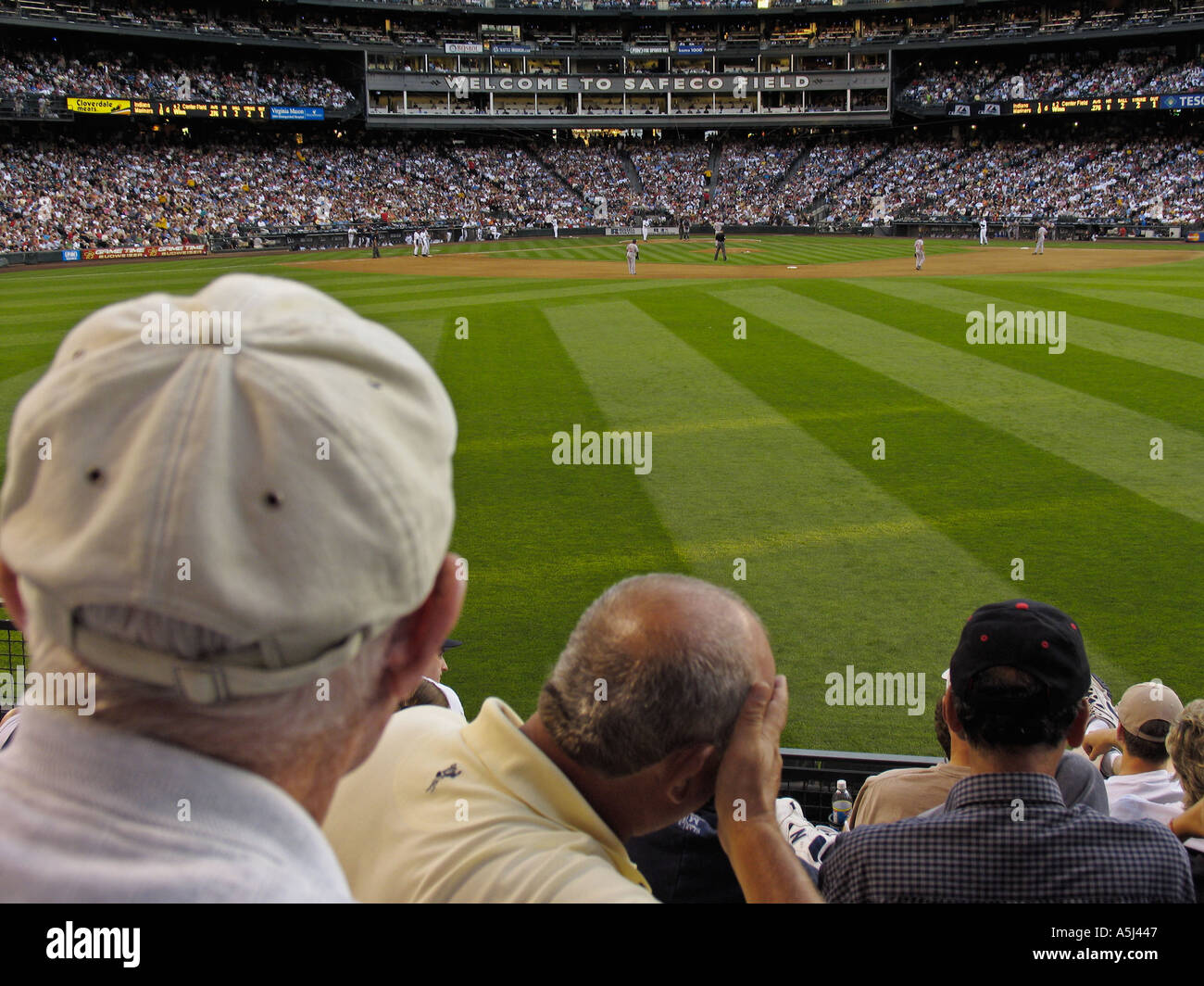 Fans sitting in outfield watch major league baseball game between ...