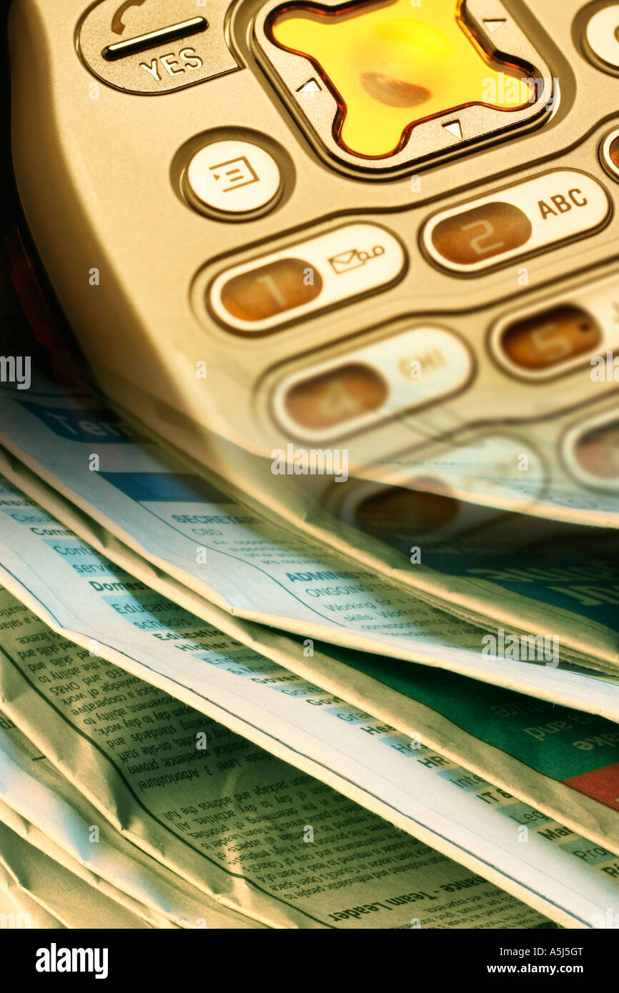 Mobile Phone and Newspapers Stock Photo - Alamy