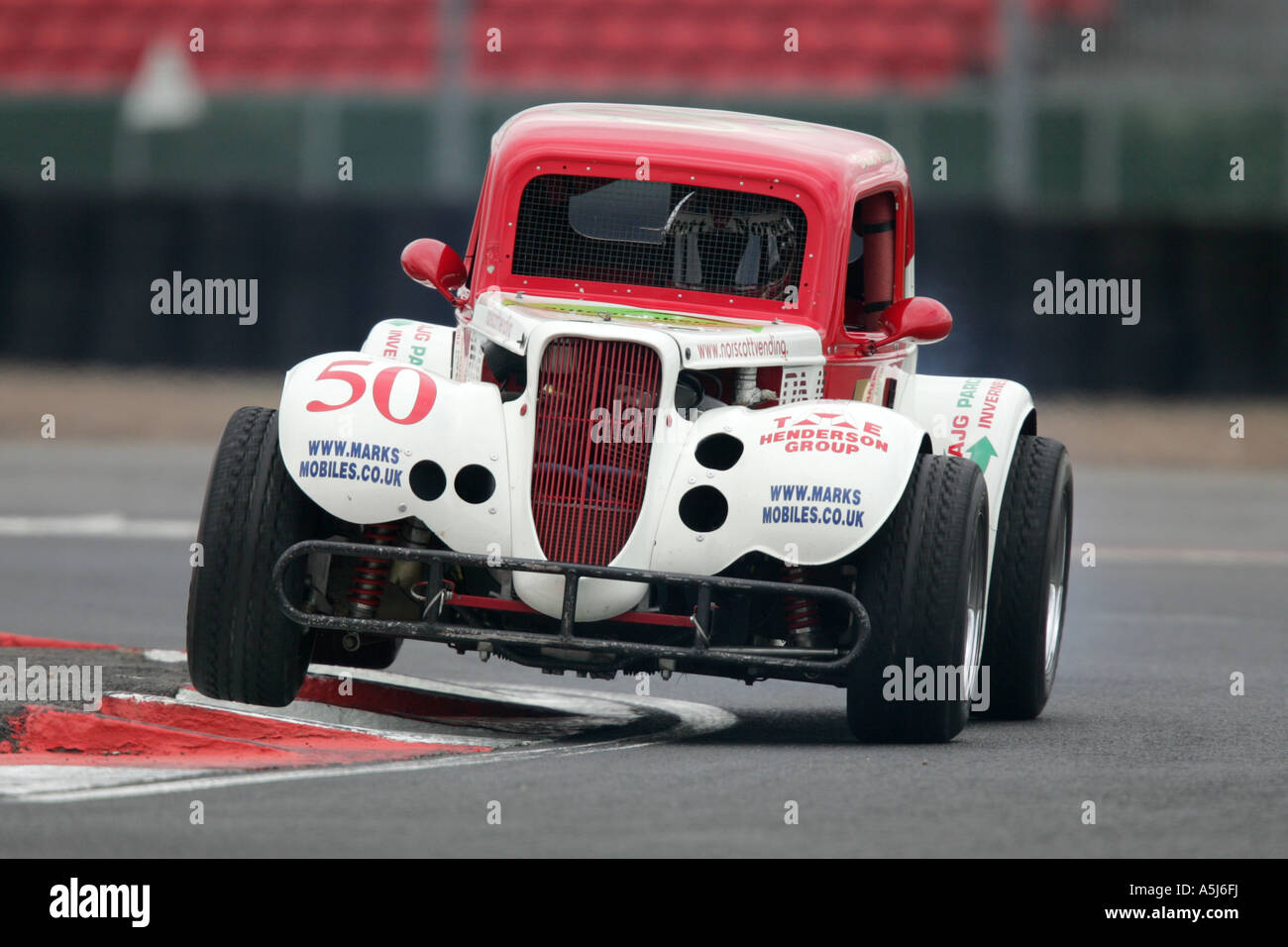 Car taking corner at speed hi-res stock photography and images - Alamy