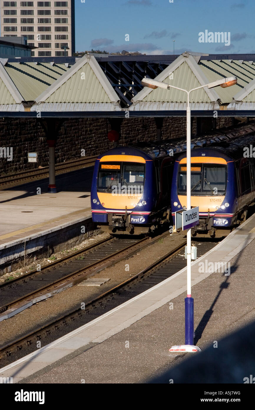 Two trains side by side at the railway station in Dundee, UK Stock ...