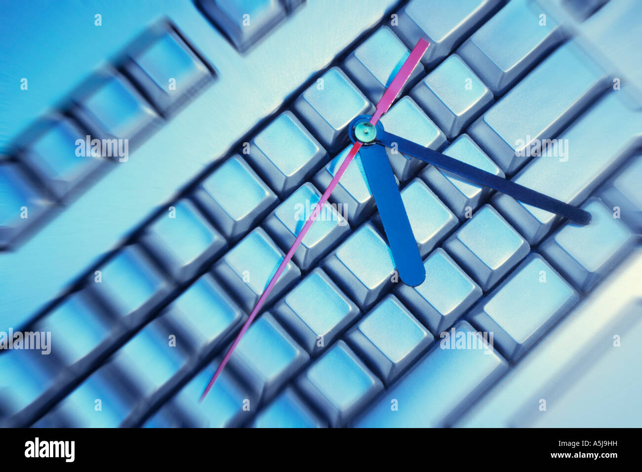 Clock Hands on Computer Keyboard Stock Photo - Alamy
