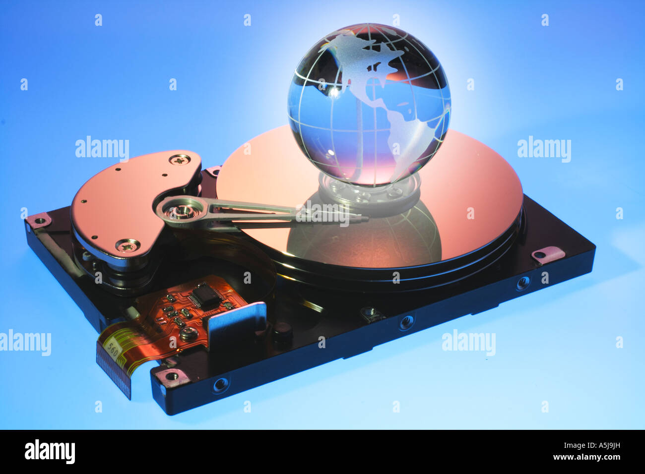 Crystal Globe on Hard Disk Stock Photo - Alamy