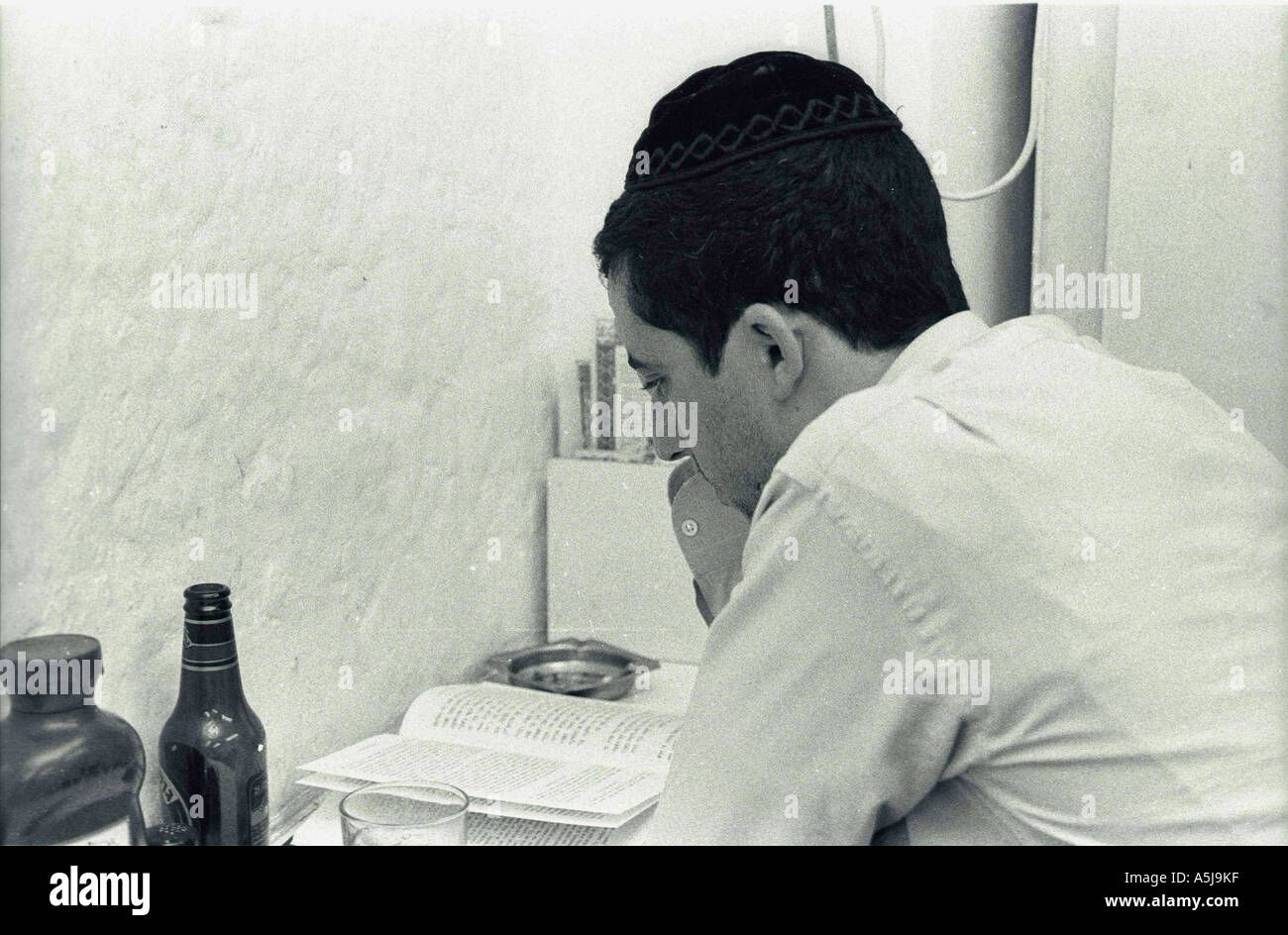 A young man studying late at night Stock Photo - Alamy