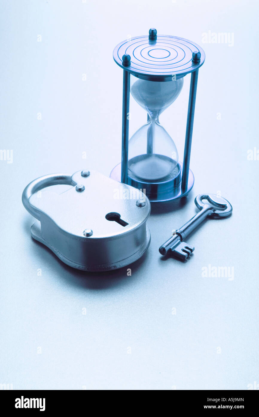 Hourglass with Padlock and Key Stock Photo - Alamy