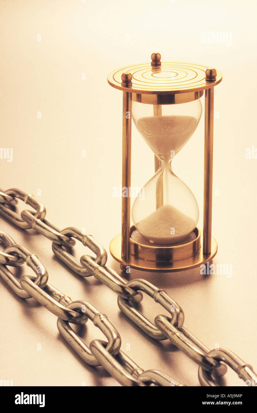 Hourglass and Chains Stock Photo - Alamy