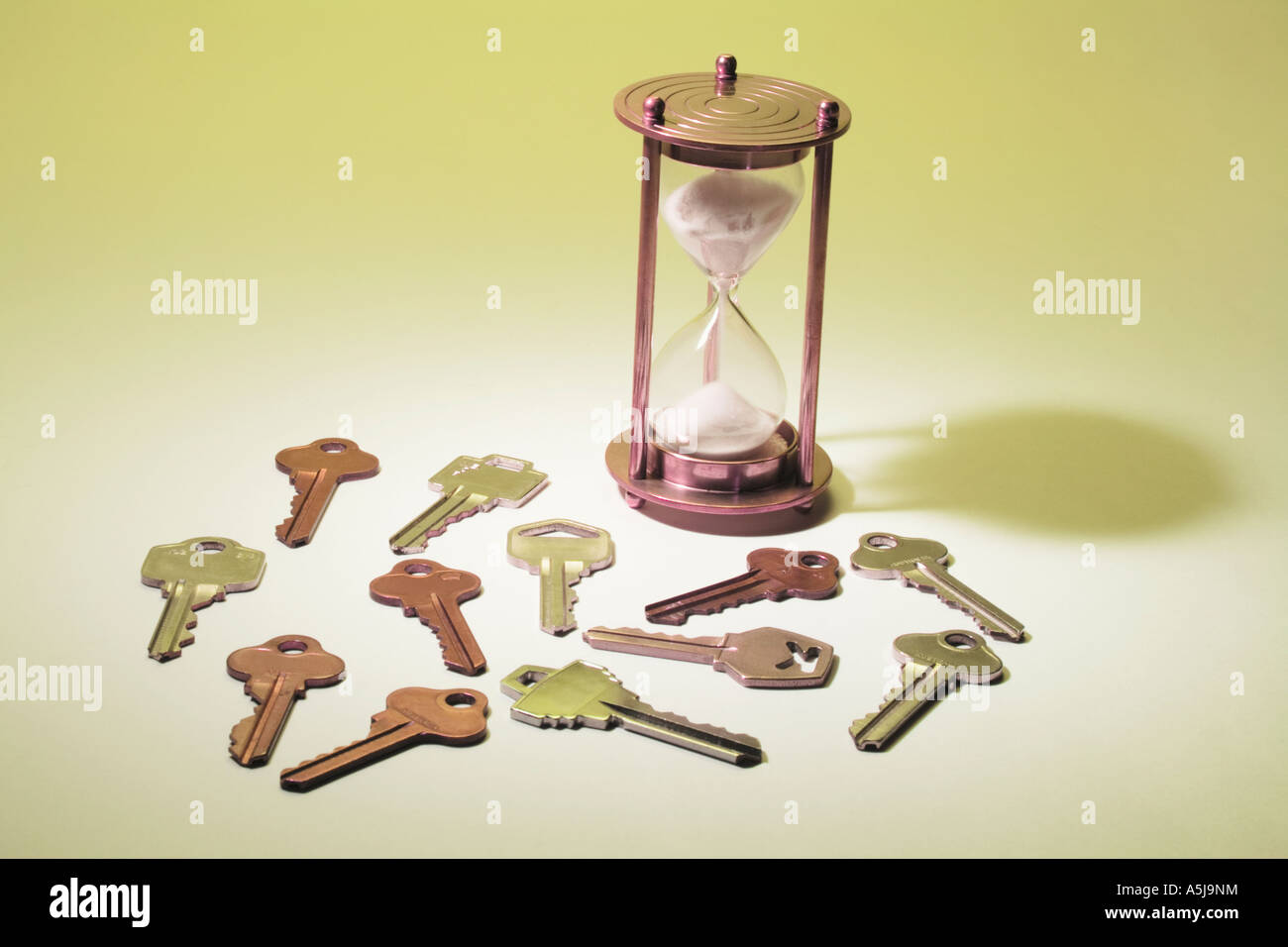 Keys and Hourglass Stock Photo - Alamy
