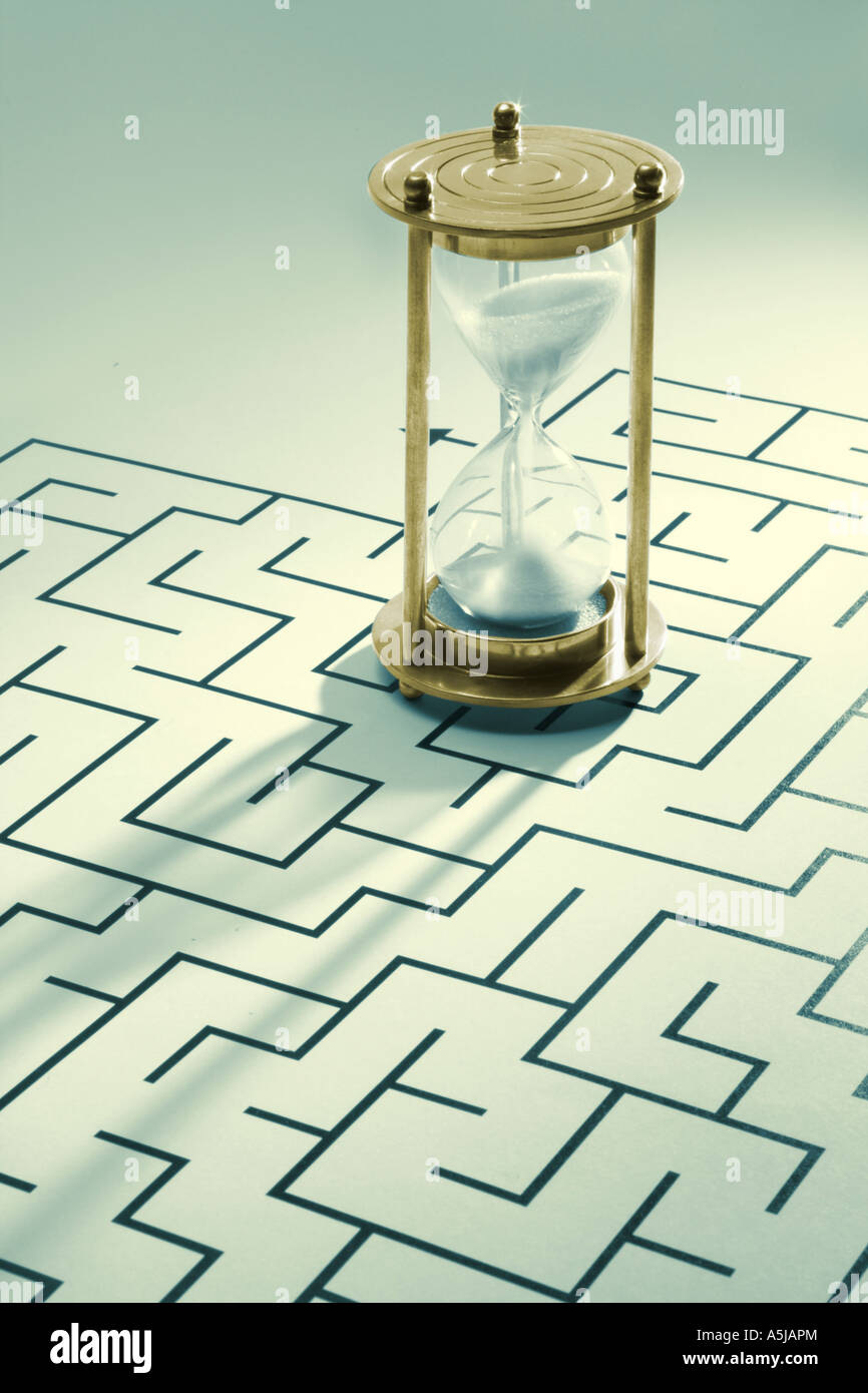 Hourglass on Maze Stock Photo - Alamy