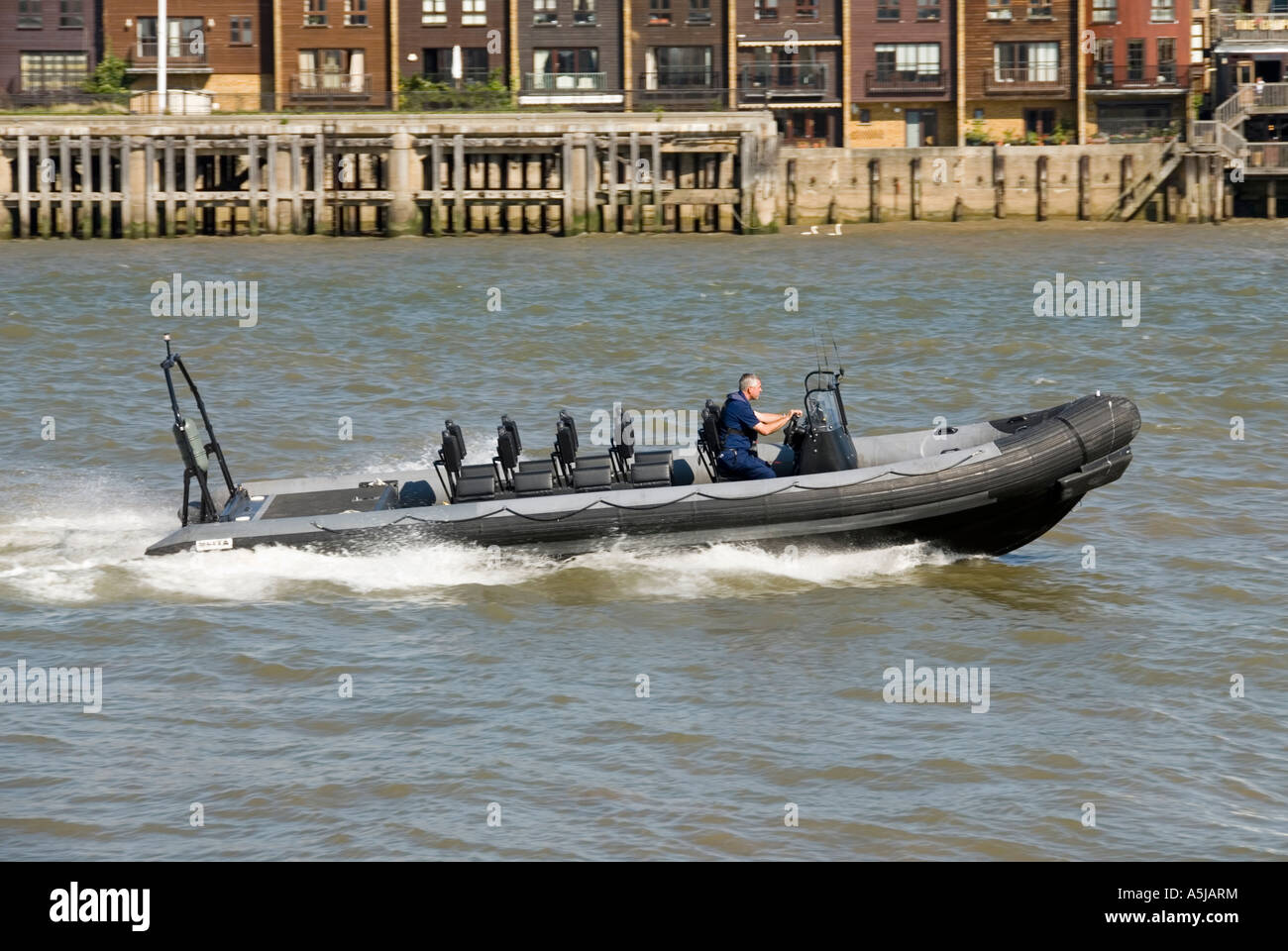River Thames fast response inflatable motor patrol boat travelling at ...