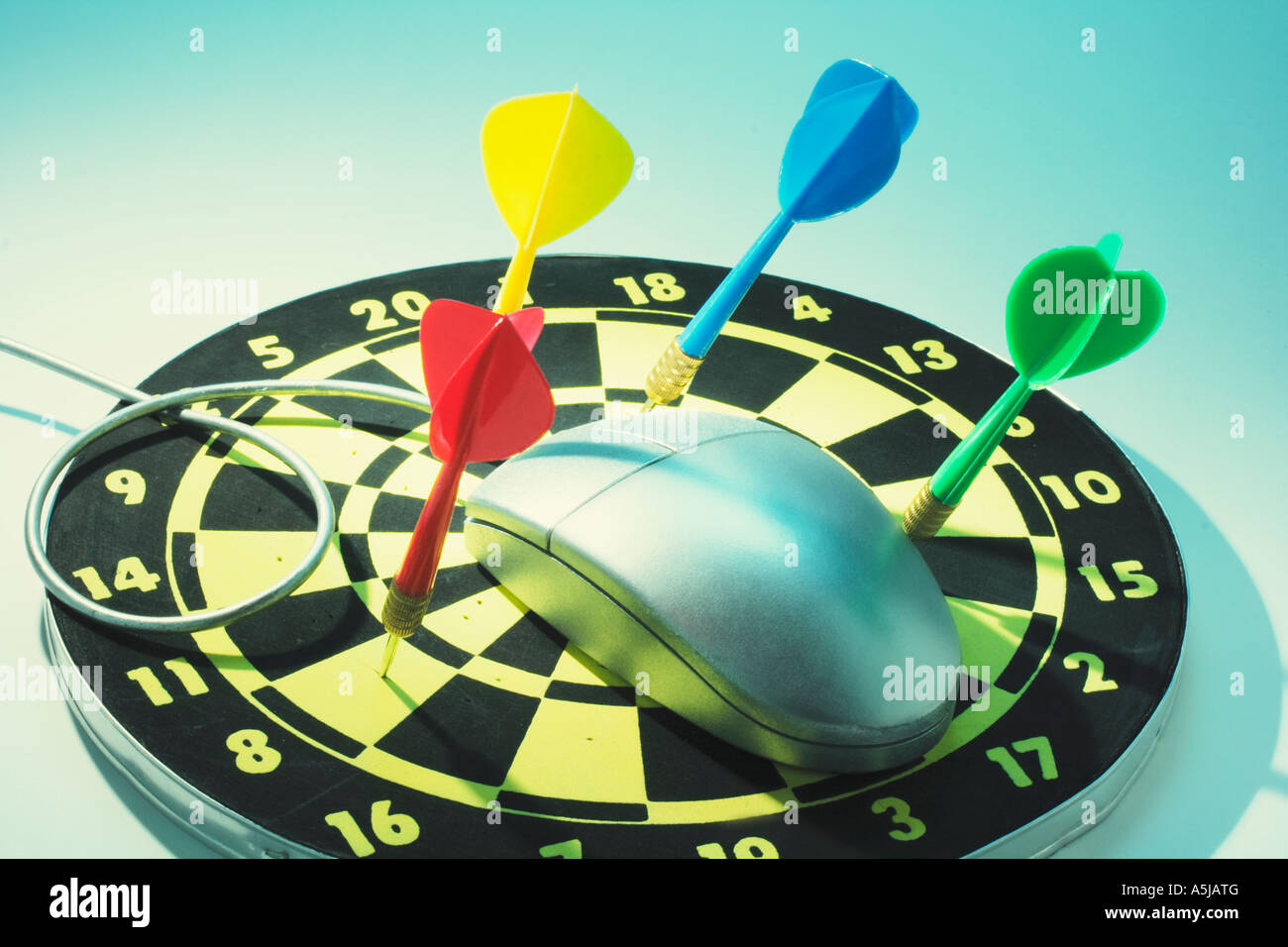 Computer Mouse and Darts on Dart Board Stock Photo - Alamy