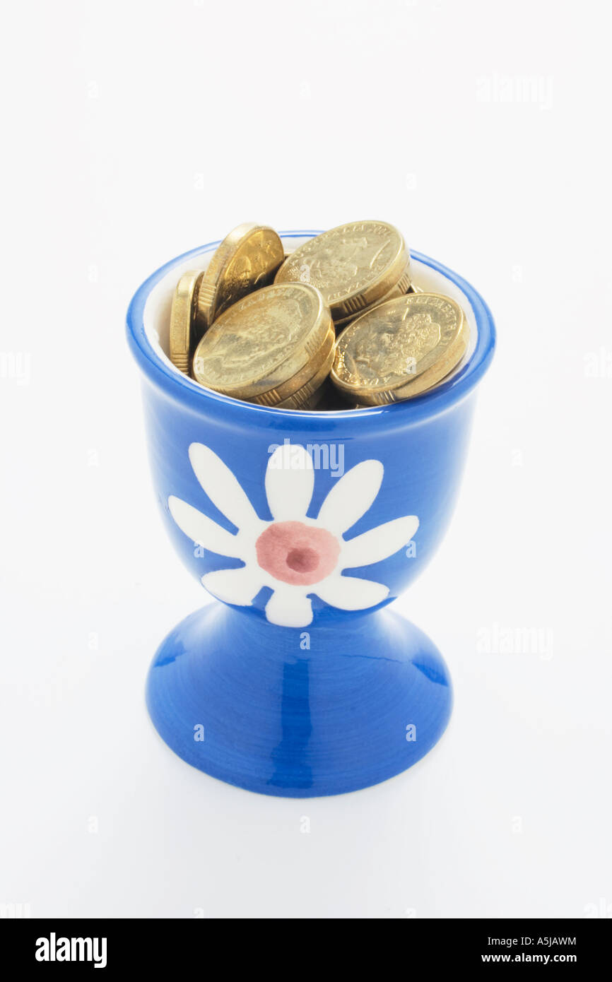 Cup coins full hi-res stock photography and images - Alamy