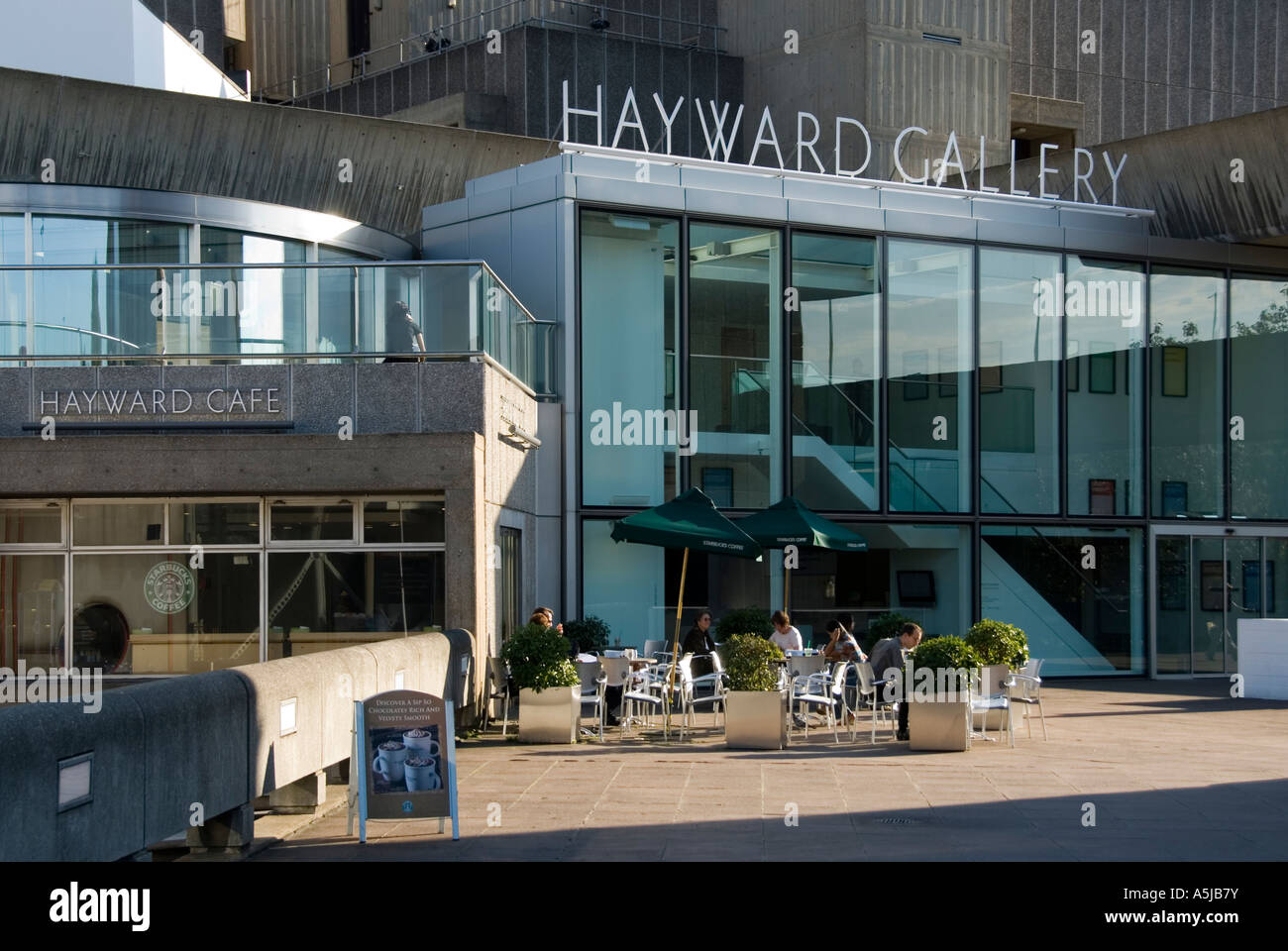 Hayward Gallery and cafe in the Southbank complex with people at ...
