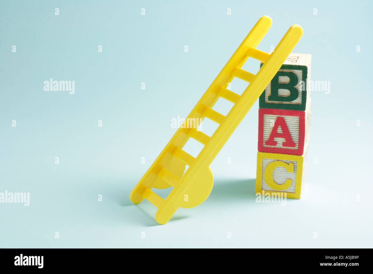 Alphabet Blocks with Toy Ladder Stock Photo - Alamy