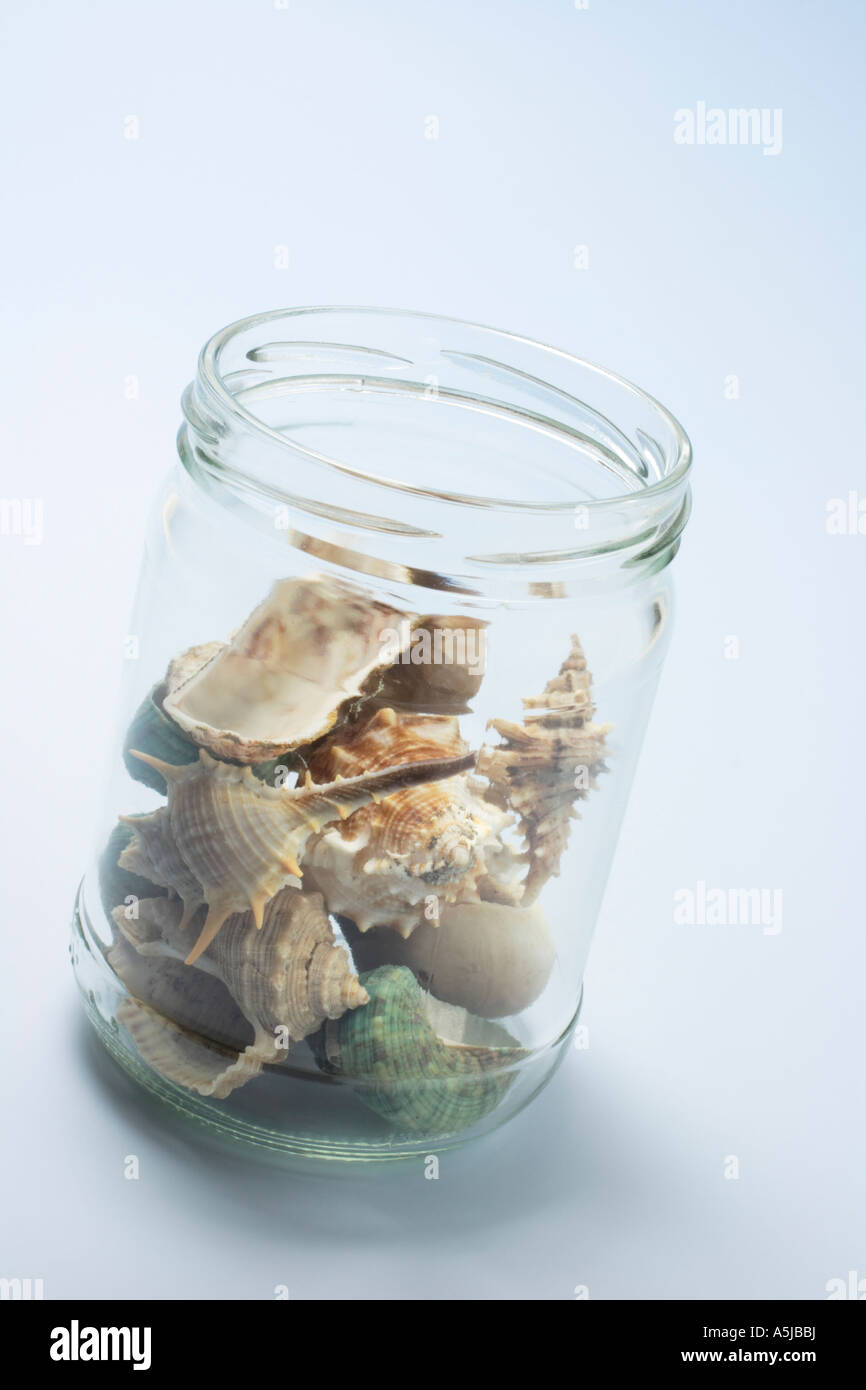 Seashells in Glass Bottle Stock Photo - Alamy