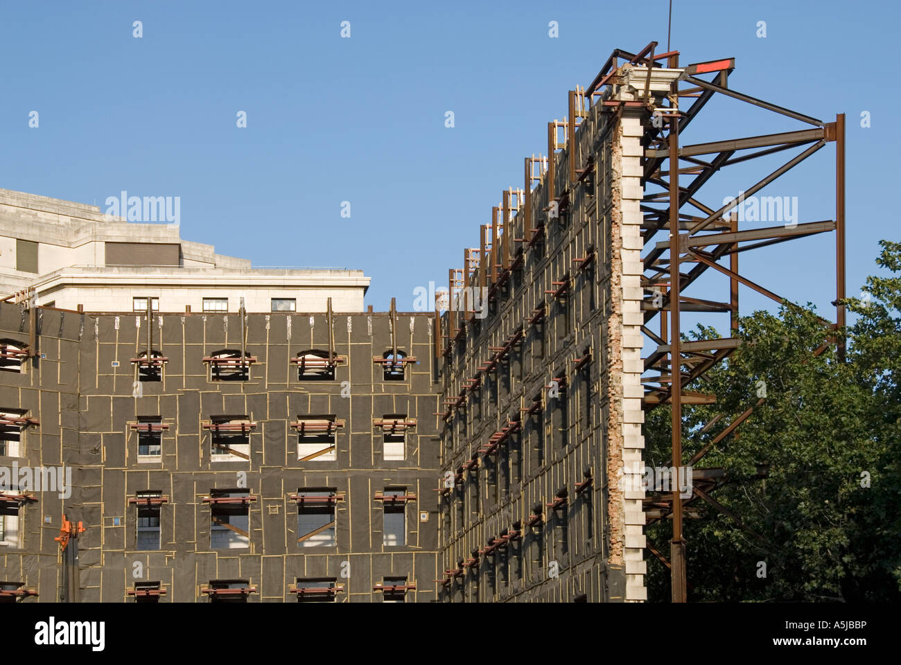 Temporary steel shoring used to give structural support to masonry ...