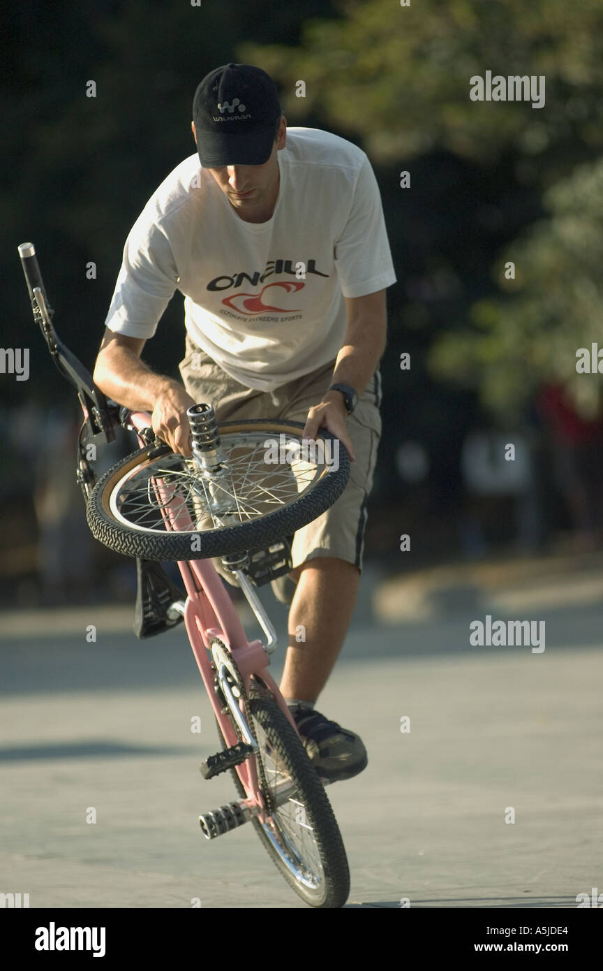 BMX riders demonstrate their skills at an open air competition in Sofia ...