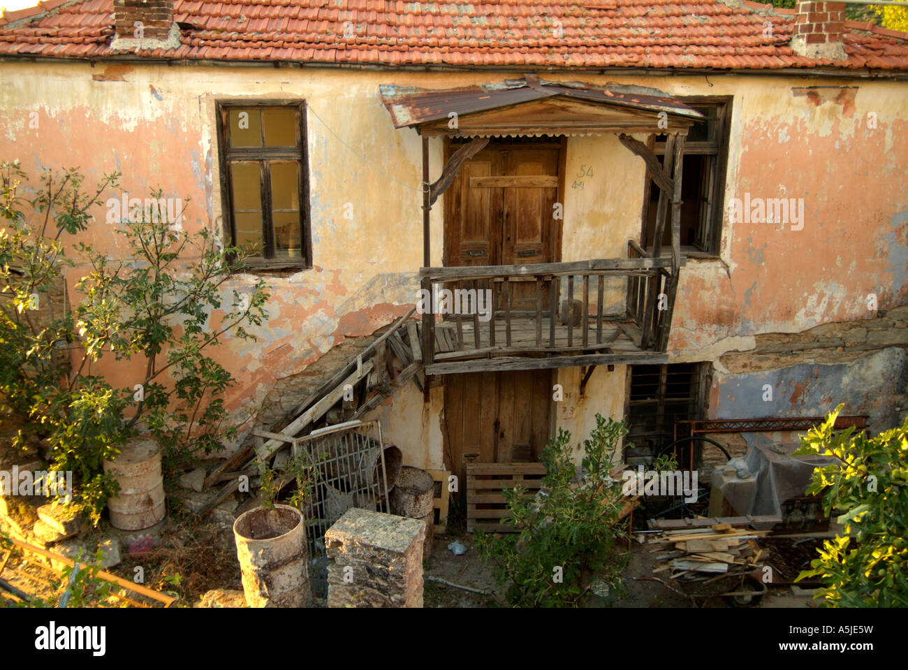 Abandoned derelict house in a village Stock Photo - Alamy