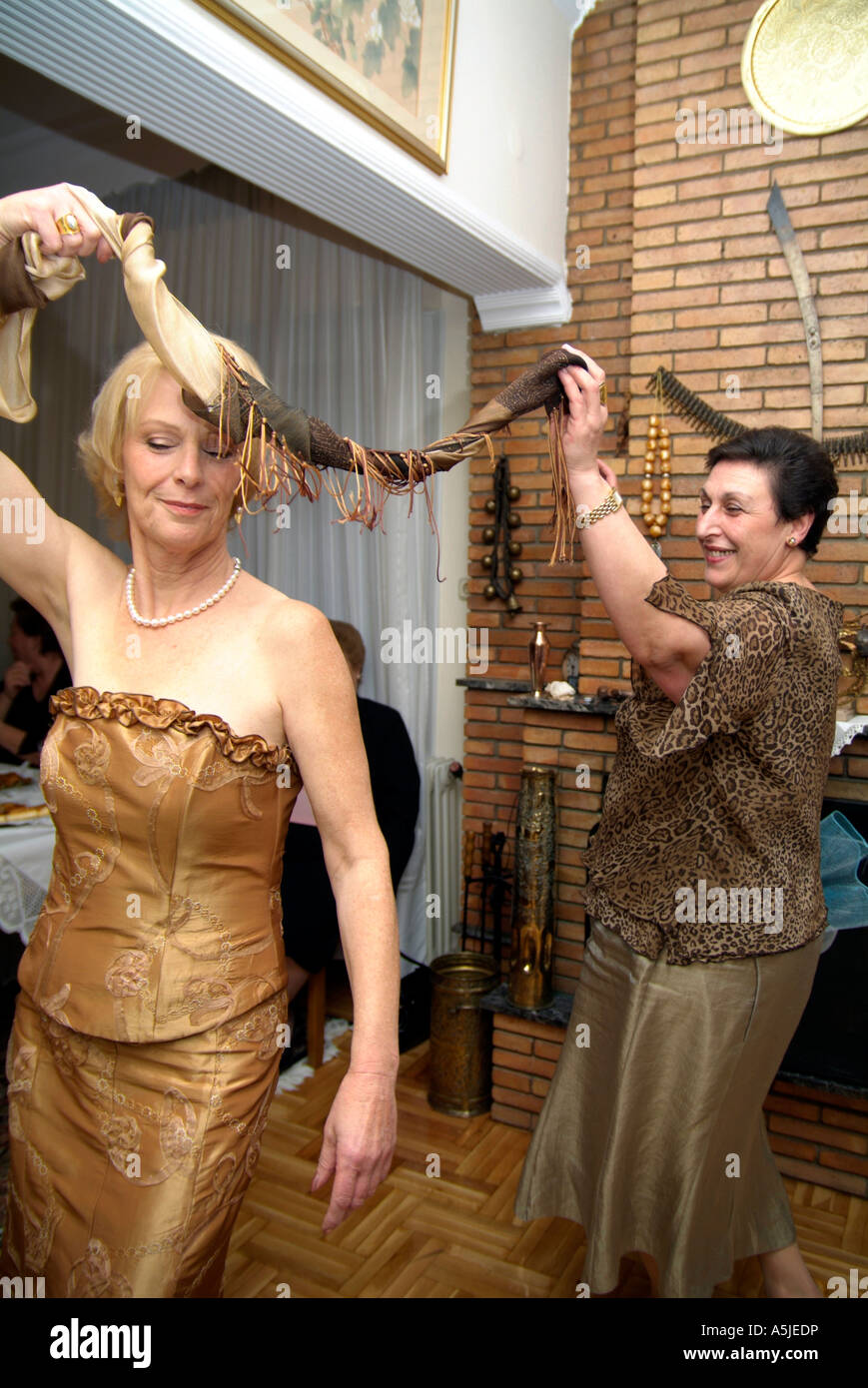 Circle dancing at a Greek Orthodox wedding reception Stock Photo - Alamy