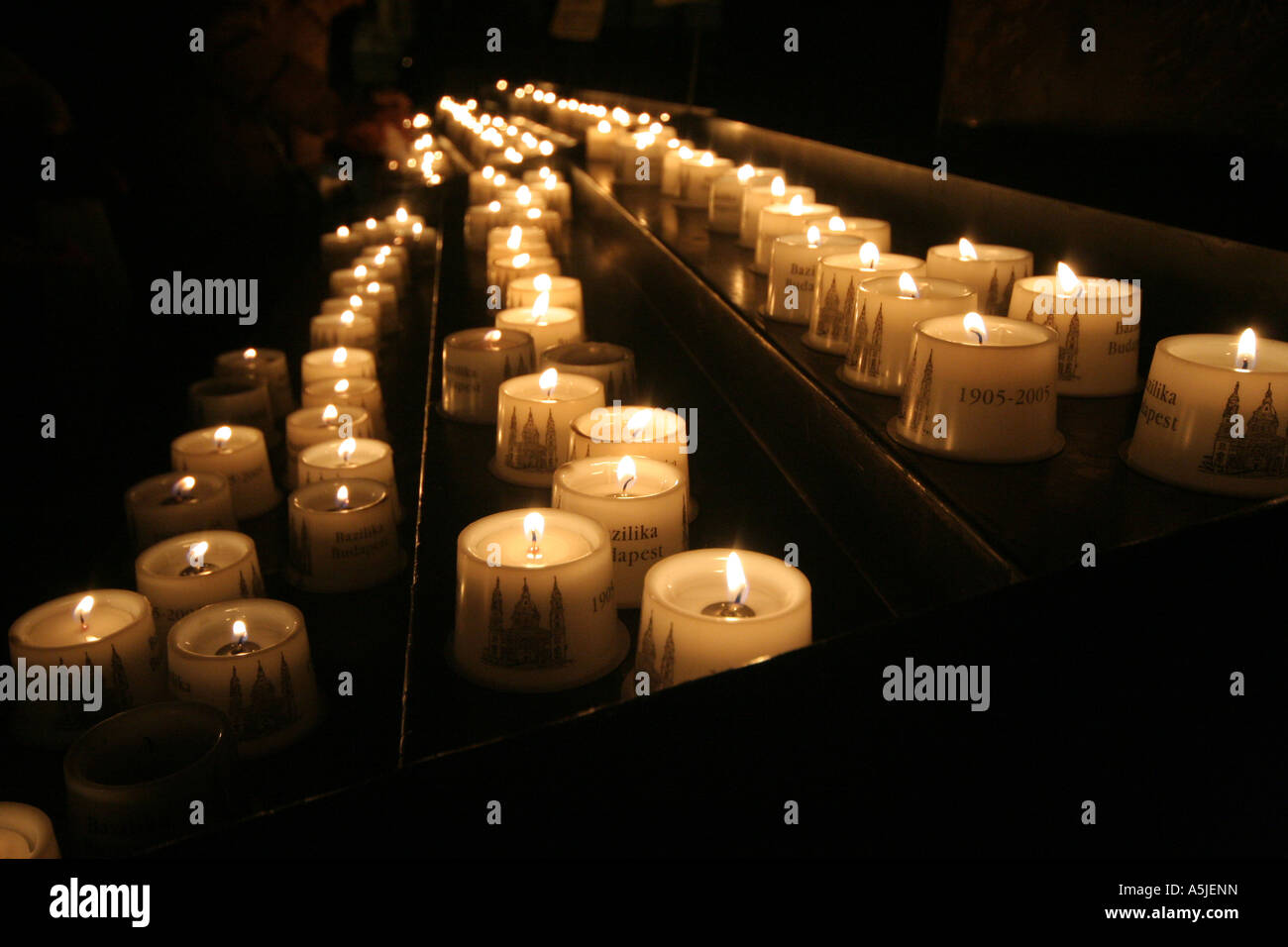 Candles in a church Stock Photo - Alamy