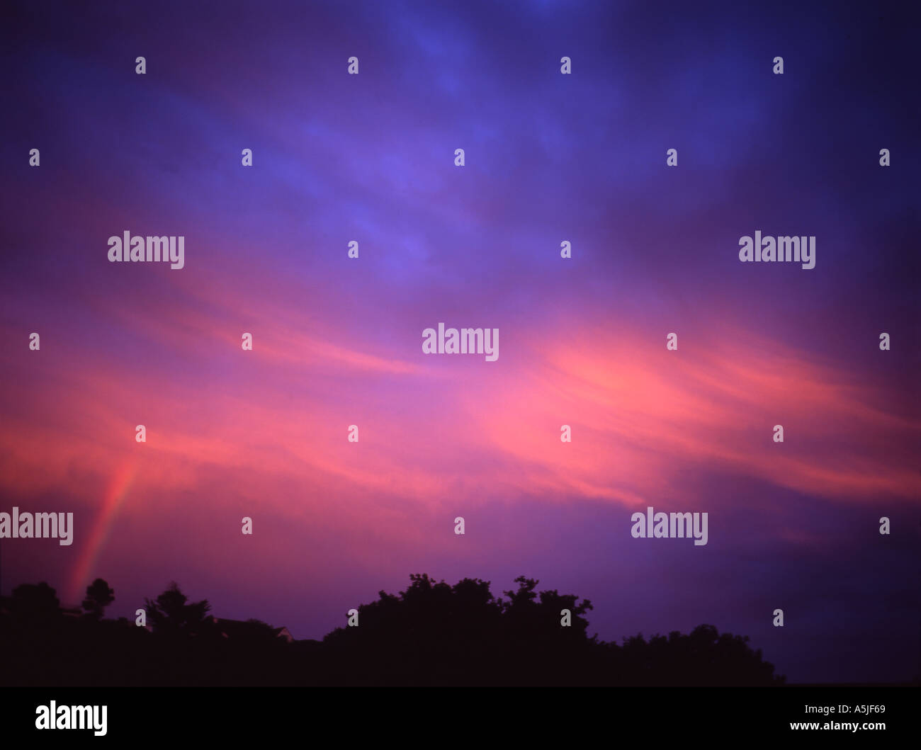Red Sky Rainbow Stock Photo - Alamy