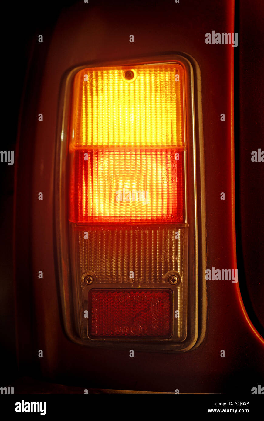 illuminated tail and rear indicator light on rover mini Stock Photo - Alamy