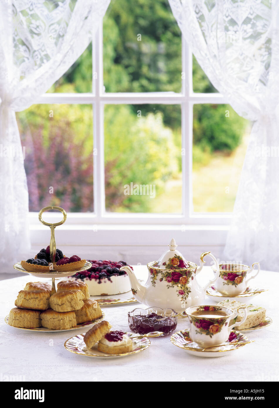 Afternoon tea by the window England Stock Photo - Alamy
