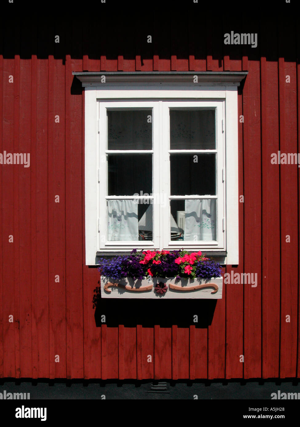 window of a typical scandinavian wooden house in Avesta Sweden Stock ...