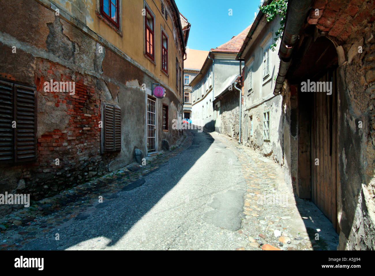 lane with old decayed houses in the rafter quarter Lent in the old town ...