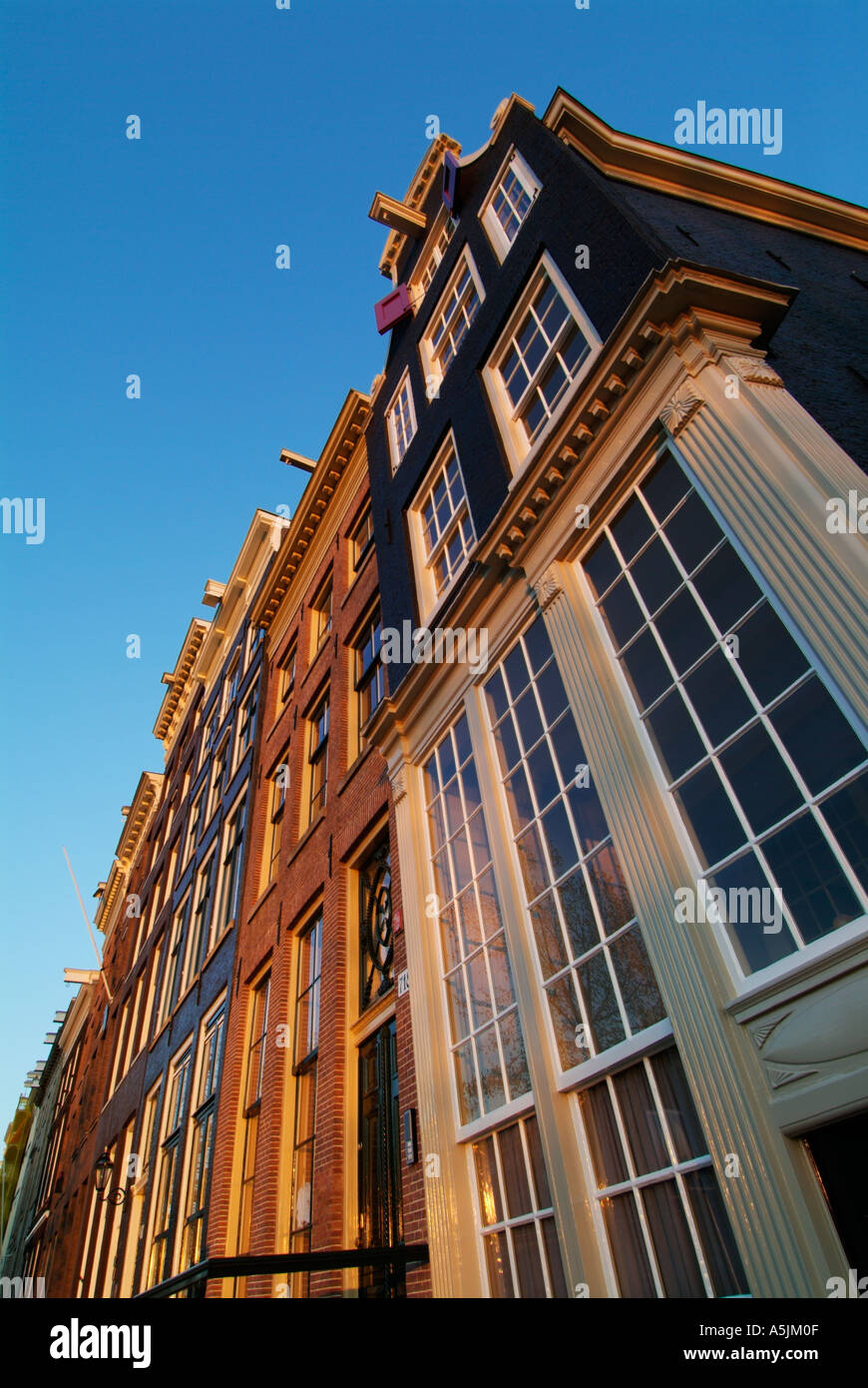 Twilight on the canalside houses in Amsterdam Netherlands Holland EU ...