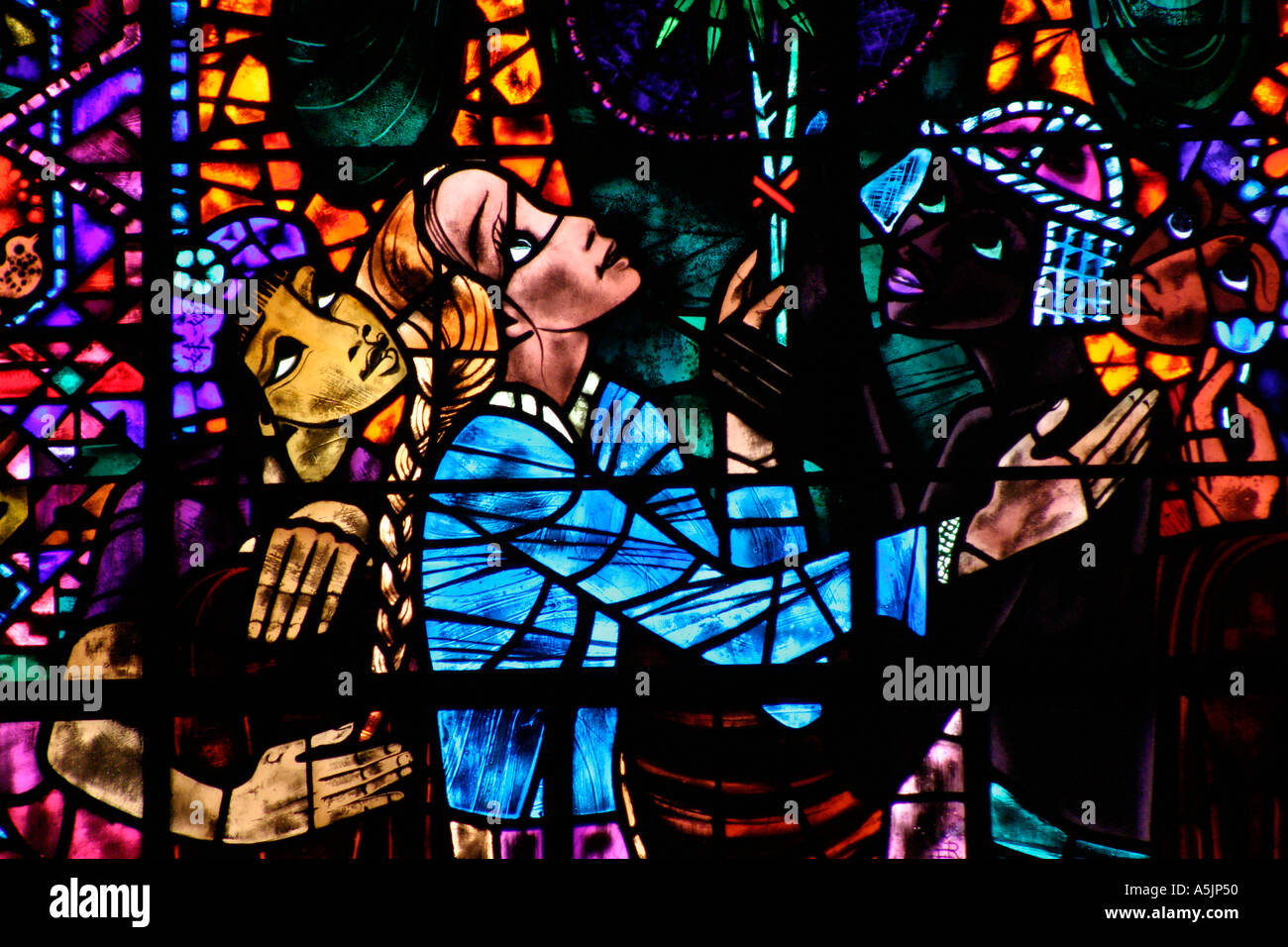 A Stained Glass window depicting peace among the nations of the world ...