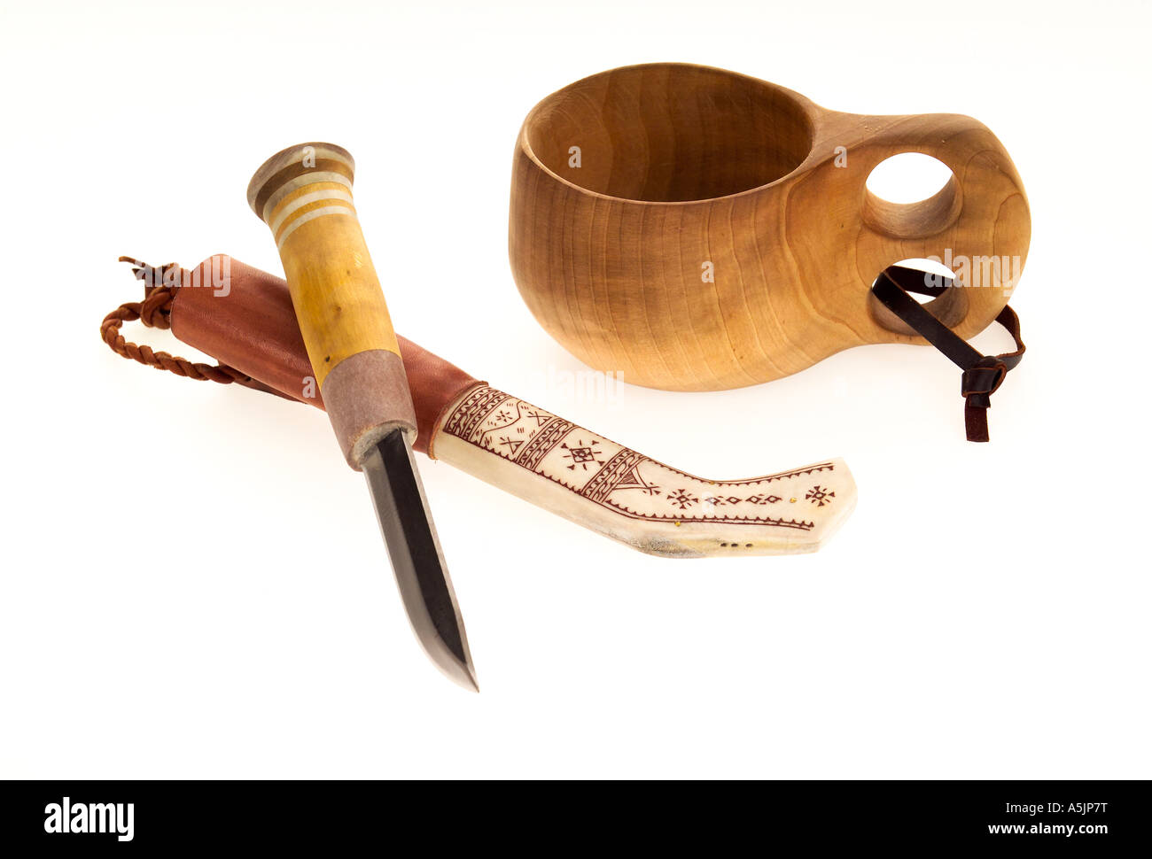 Traditional Sami sheath knife and wood mug from Northern Sweden Stock ...