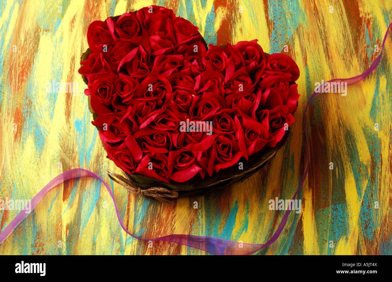 Rose heart and ribbon Stock Photo - Alamy