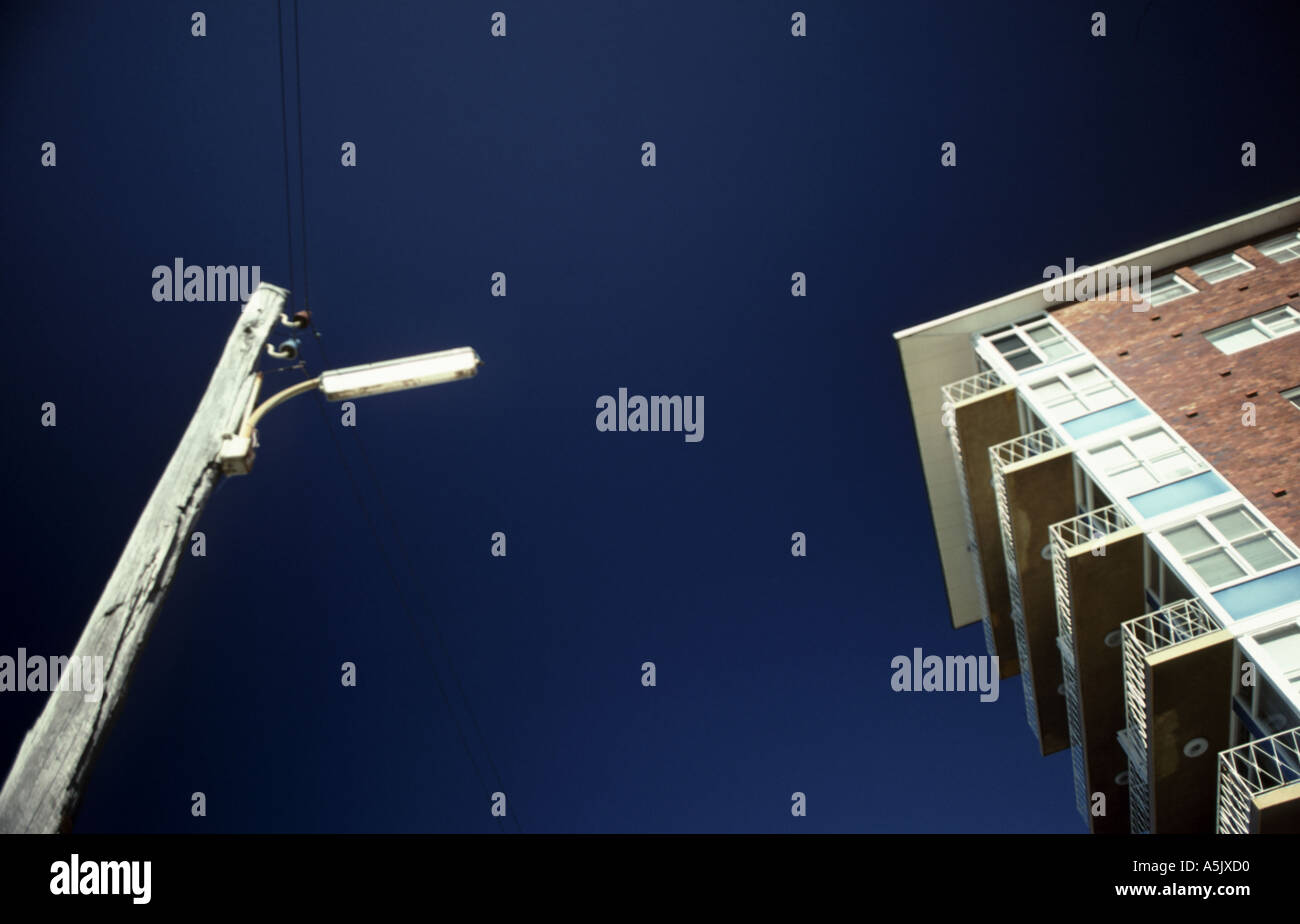 A WHITE BUILDING SHOT FROM A LOW VIEWPOINT AGAINST A DARK SKY BAPD139 ...