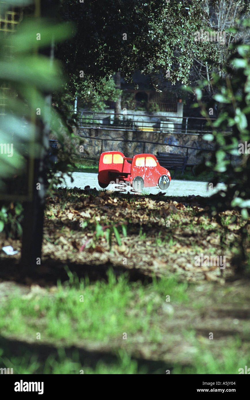 red toy car playground ride Stock Photo - Alamy
