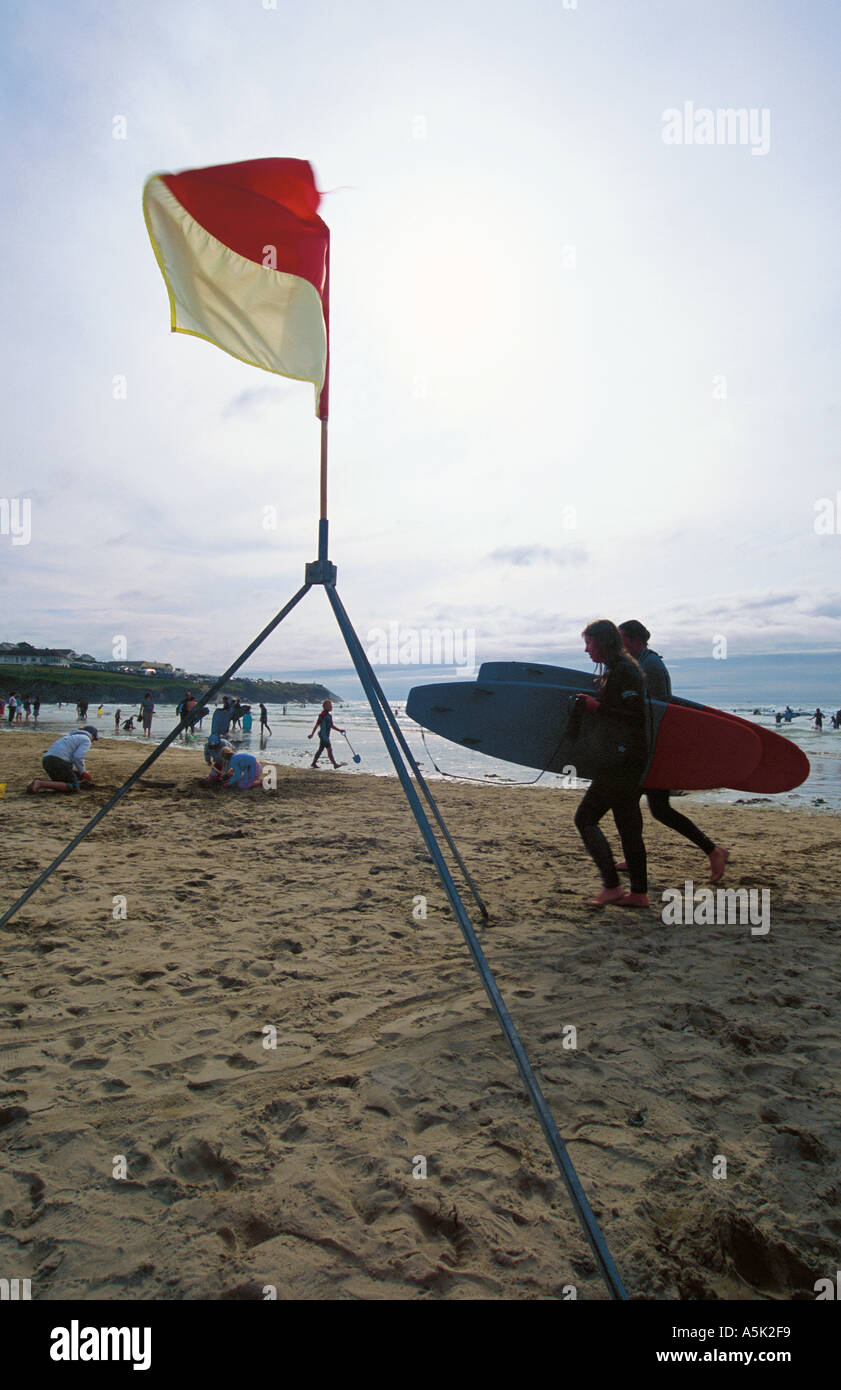 Lifeguard flag on Polzeath beach near Padstow Cornwall Great Britain ...