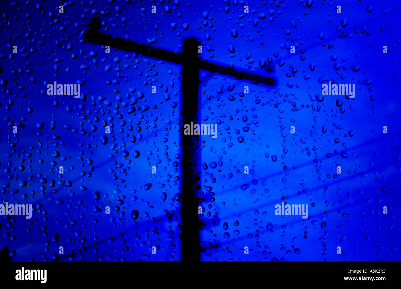 abstract image of electrical wires and pole rain drops night Stock ...
