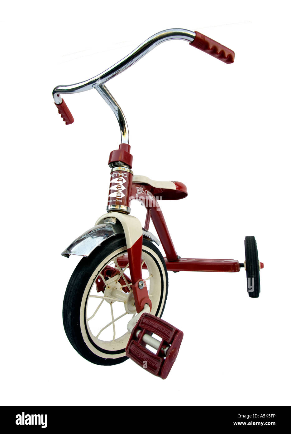 Red tricycle silhouetted on a white background Stock Photo - Alamy