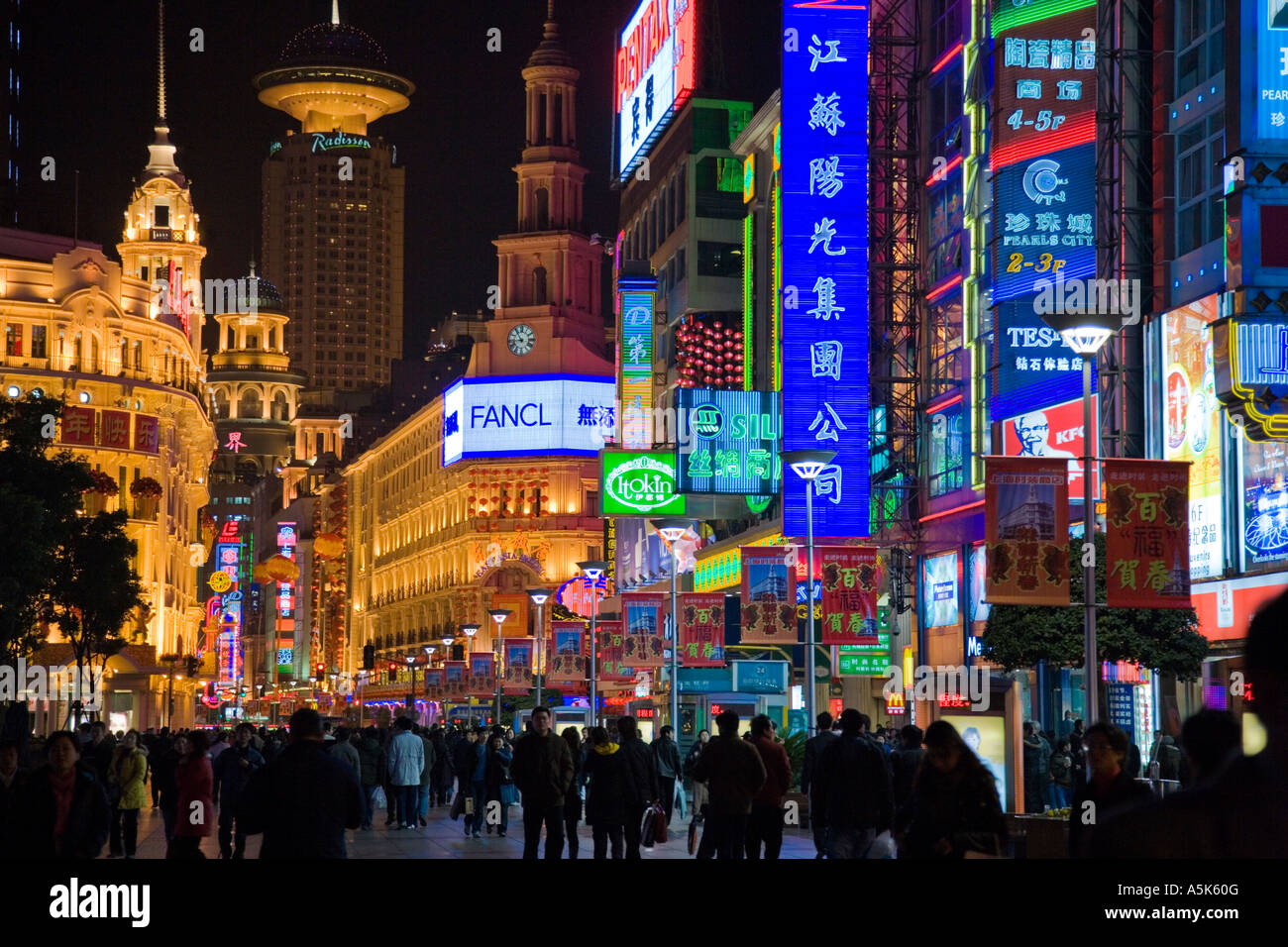 Neon lights at night Nanjing Road Dong Lu shopping street Shanghai ...