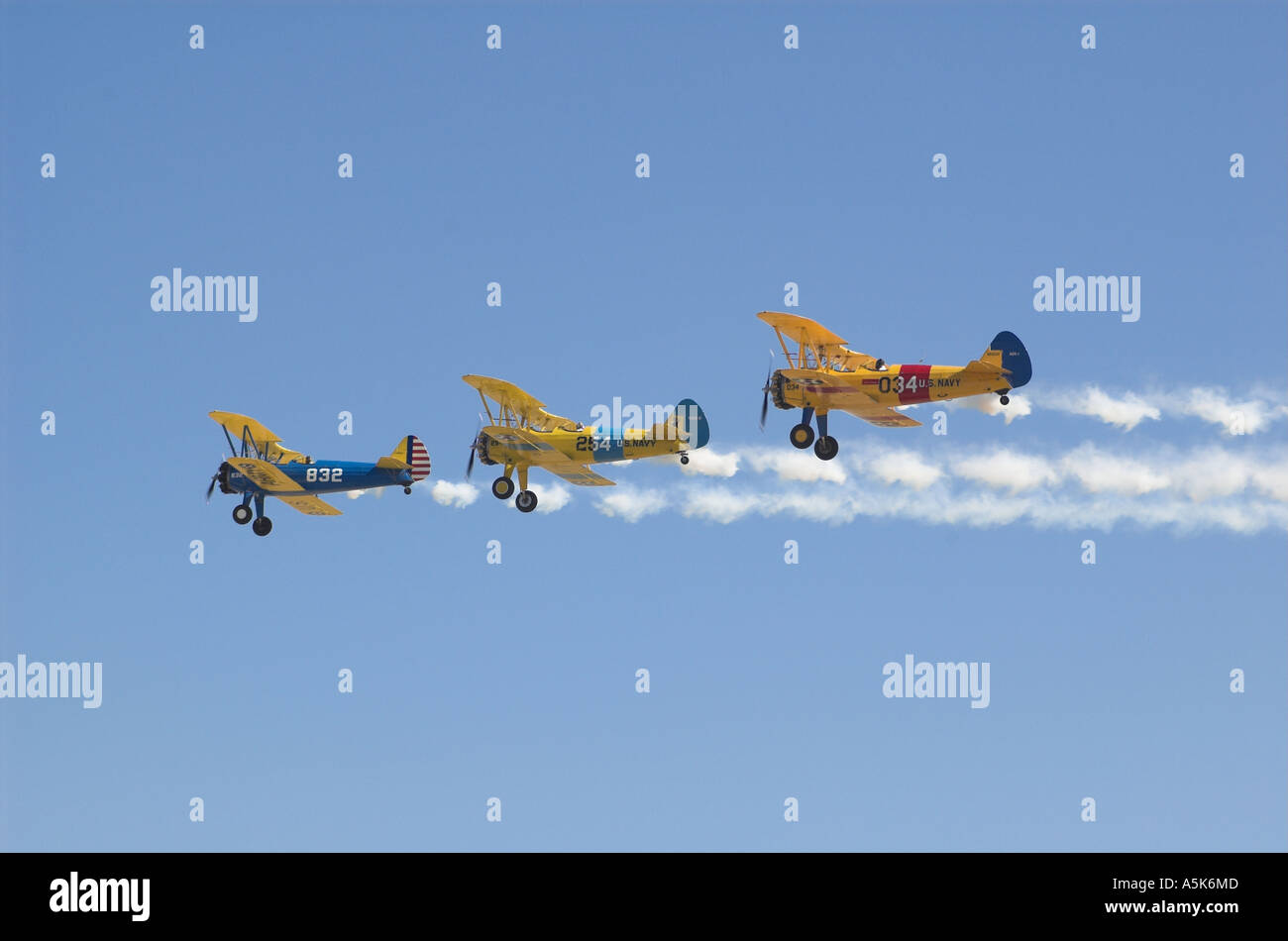 Three Stearman Biplanes in formation (U.S. Navy and Army Versions Stock ...