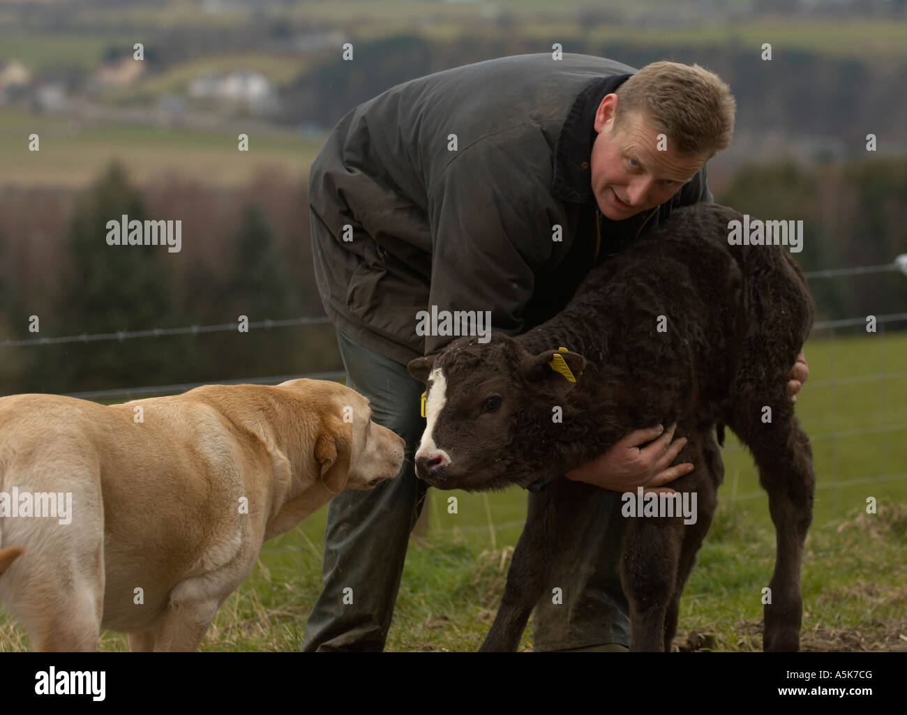Farmer lifting hi-res stock photography and images - Alamy