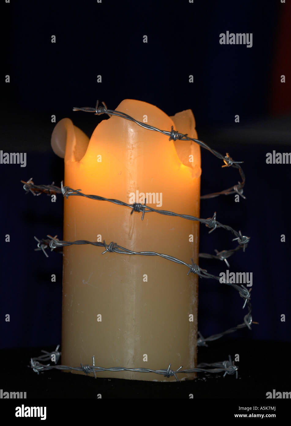 Candle burning barbed wire hi-res stock photography and images - Alamy
