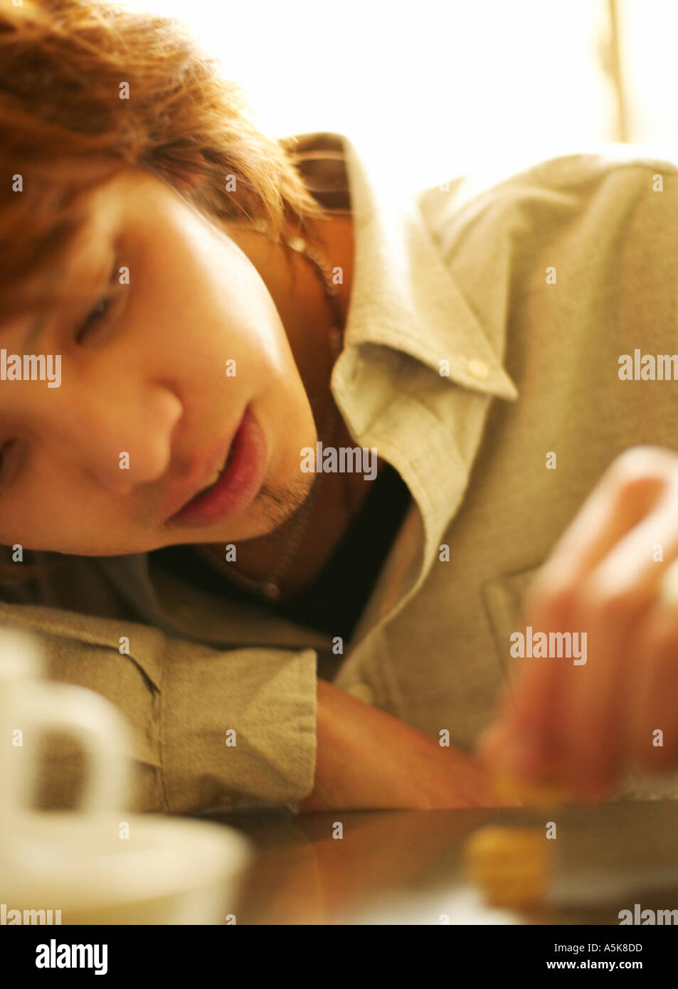 Leaning forward table hi-res stock photography and images - Alamy