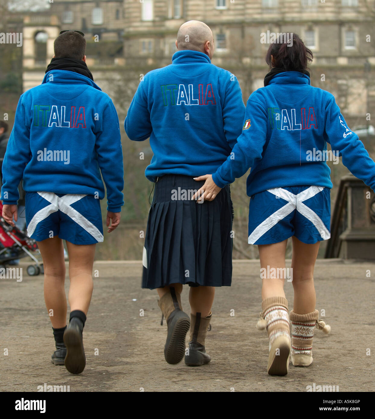 Italy rugby fans trio wearing kilt and shorts with large St Andrew ...
